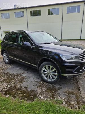 Melns Volkswagen Touareg 2014 Limbaži, ar dzinēja tilpumu 3.00 L un nobraukumu 235 tūkst. km par 13200 €, foto 4 vietnē AUTOMOTO.COM.LV