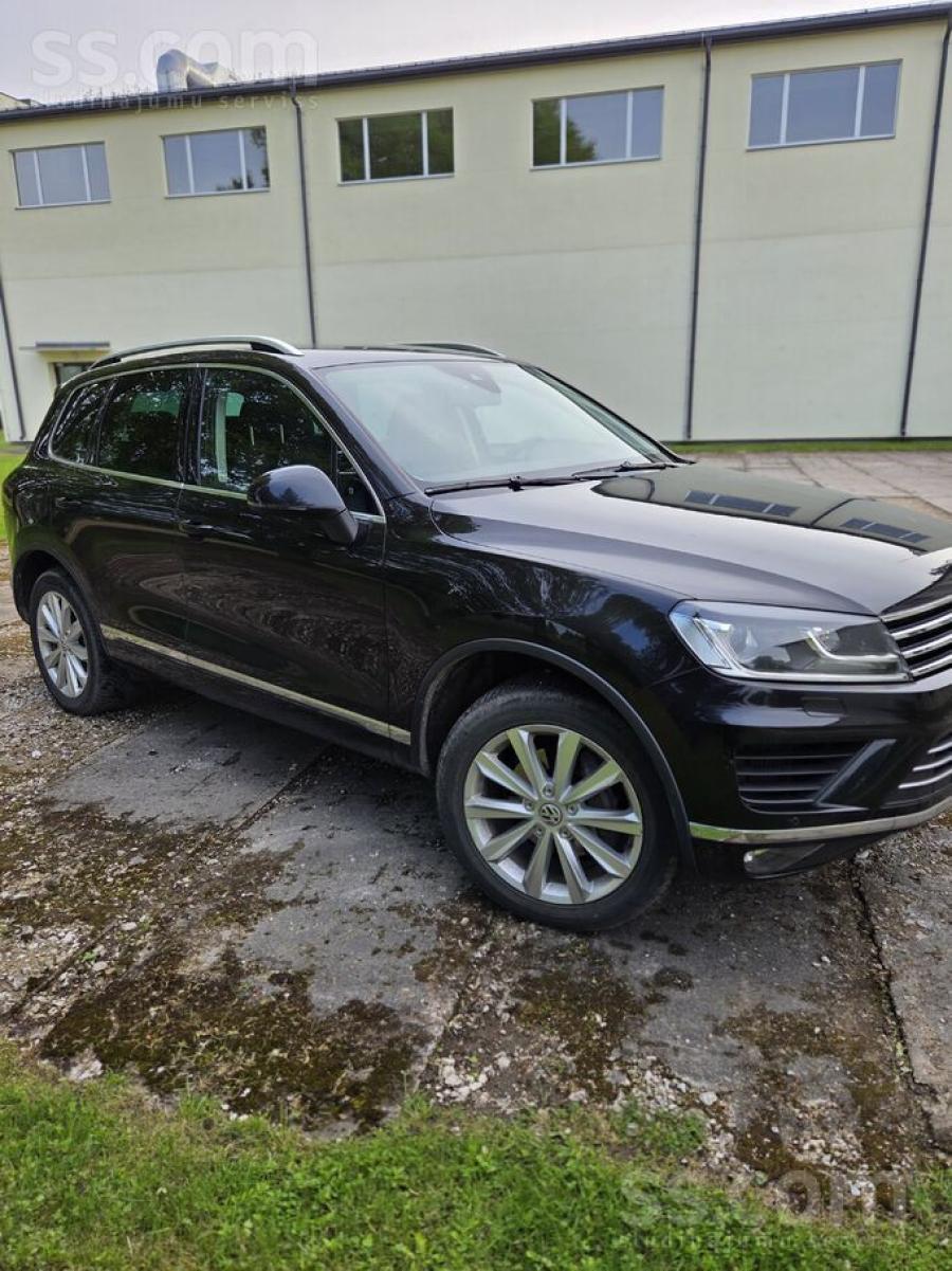 Melns Volkswagen Touareg 2014 Limbaži, ar dzinēja tilpumu 3.00 L un nobraukumu 235 tūkst. km par 13200 €, foto 4 vietnē AUTOMOTO.COM.LV