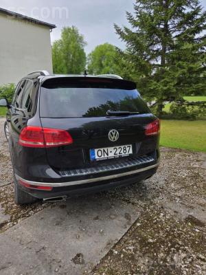 Melns Volkswagen Touareg 2014 Limbaži, ar dzinēja tilpumu 3.00 L un nobraukumu 235 tūkst. km par 13200 €, foto 5 vietnē AUTOMOTO.COM.LV