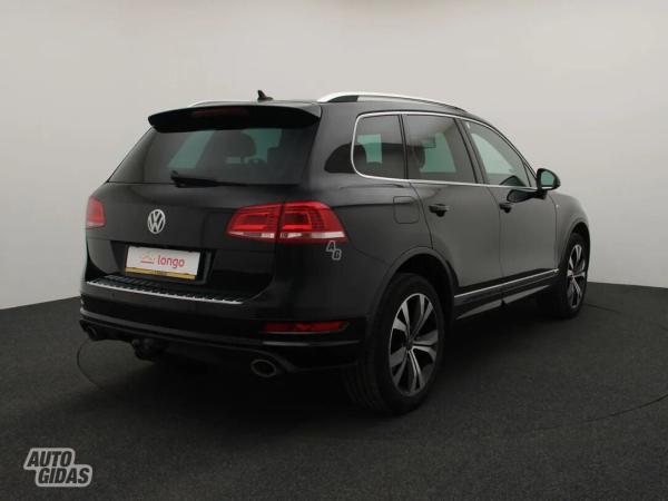 Black Volkswagen Touareg 2014 in Vilnius, with an engine capacity of 3.00 L and mileage of 268 thousand km for 14099 €, photo 8 on AUTOMOTO.COM.LV