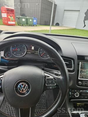 Black Volkswagen Touareg 2014 in Riga, with an engine capacity of 3.00 L and mileage of 186 thousand km for 16000 €, photo  on AUTOMOTO.COM.LV