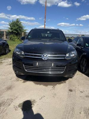 Melns Volkswagen Touareg 2014 Jurbarkas, ar dzinēja tilpumu 3.00 L un nobraukumu 300 tūkst. km par 10499 €, foto 21 vietnē AUTOMOTO.COM.LV