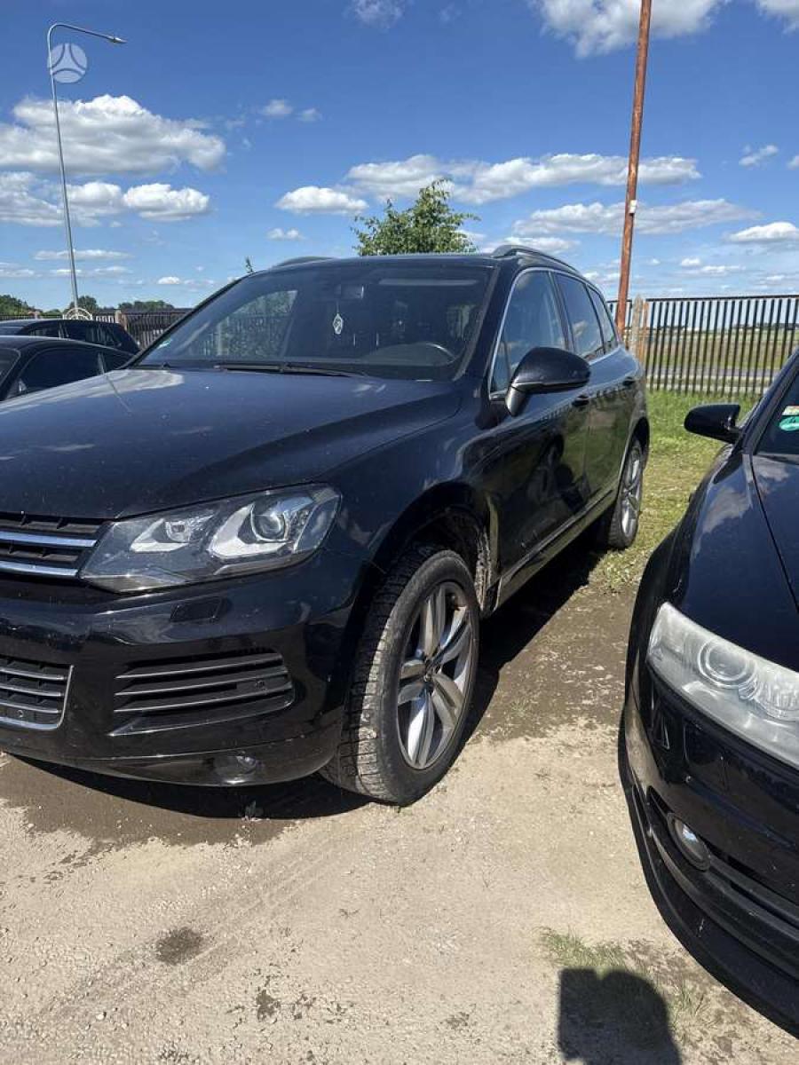 Melns Volkswagen Touareg 2014 Jurbarkas, ar dzinēja tilpumu 3.00 L un nobraukumu 300 tūkst. km par 10499 €, foto 22 vietnē AUTOMOTO.COM.LV