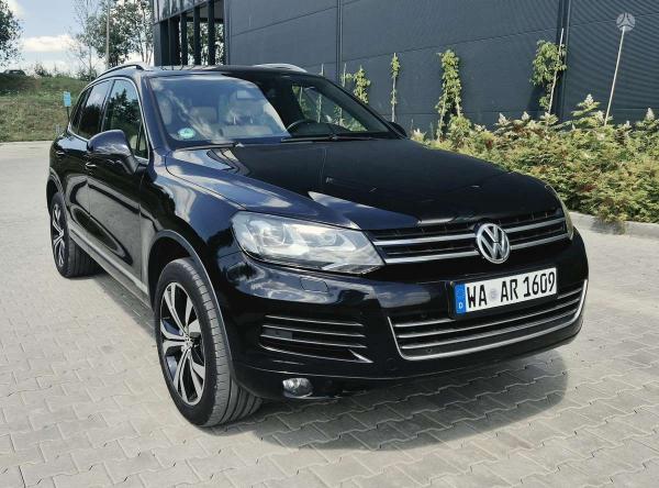 Black Volkswagen Touareg 2014 in Vilnius, with an engine capacity of 2.97 L and mileage of 203 thousand km for 14499 €, photo 3 on AUTOMOTO.COM.LV