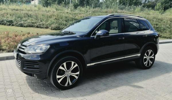 Black Volkswagen Touareg 2014 in Vilnius, with an engine capacity of 2.97 L and mileage of 203 thousand km for 14499 €, photo 7 on AUTOMOTO.COM.LV