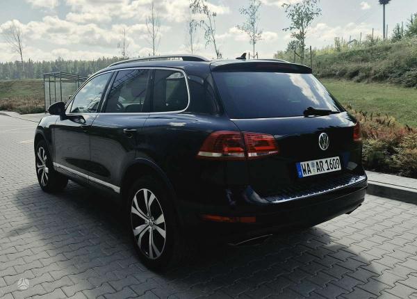 Black Volkswagen Touareg 2014 in Vilnius, with an engine capacity of 2.97 L and mileage of 203 thousand km for 14499 €, photo 10 on AUTOMOTO.COM.LV