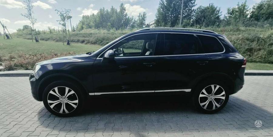 Black Volkswagen Touareg 2014 in Vilnius, with an engine capacity of 2.97 L and mileage of 203 thousand km for 14950 €, photo 9 on AUTOMOTO.COM.LV