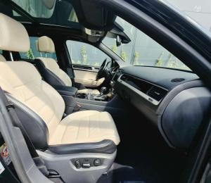 Black Volkswagen Touareg 2014 in Vilnius, with an engine capacity of 2.97 L and mileage of 203 thousand km for 14950 €, photo 16 on AUTOMOTO.COM.LV