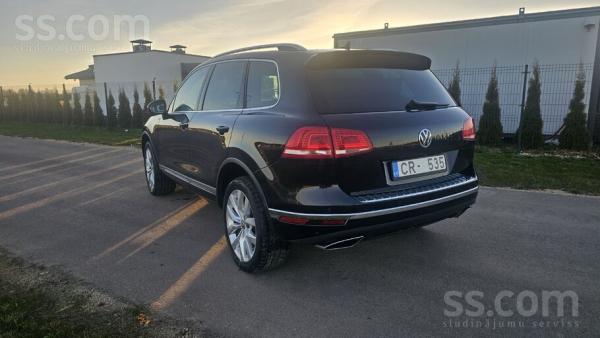 Melns Volkswagen Touareg 2014 Rīga, ar dzinēja tilpumu 3.00 L un nobraukumu 236 tūkst. km par 19000 €, foto 6 vietnē AUTOMOTO.COM.LV