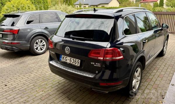 Melns Volkswagen Touareg 2014 Rīga, ar dzinēja tilpumu 3.00 L un nobraukumu 236 tūkst. km par 13800 €, foto 5 vietnē AUTOMOTO.COM.LV