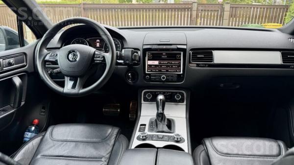 Melns Volkswagen Touareg 2014 Rīga, ar dzinēja tilpumu 3.00 L un nobraukumu 236 tūkst. km par 13800 €, foto 6 vietnē AUTOMOTO.COM.LV