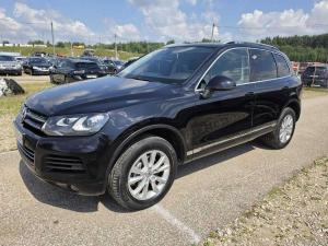 Black Volkswagen Touareg 2014 in Vilnius, with an engine capacity of 2.97 L and mileage of 253 thousand km for 11800 €, photo 4 on AUTOMOTO.COM.LV