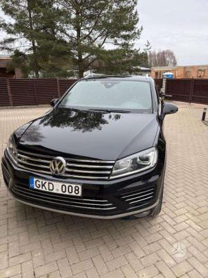 Black Volkswagen Touareg 2015 in Kaunas, with an engine capacity of 2.97 L and mileage of 339 thousand km for 14950 €, photo  on AUTOMOTO.COM.LV