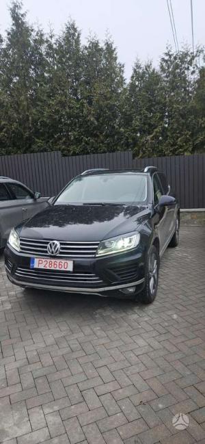 Black Volkswagen Touareg 2015 in Vilnius, with an engine capacity of 3.60 L and mileage of 305 thousand km for 12300 €, photo  on AUTOMOTO.COM.LV