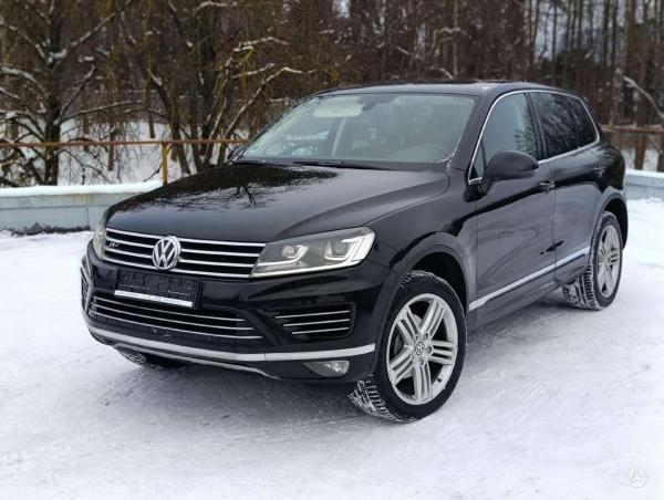 Black Volkswagen Touareg 2015 in Vilnius, with an engine capacity of 2.97 L and mileage of 250 thousand km for 15000 €, photo 1 on AUTOMOTO.COM.LV
