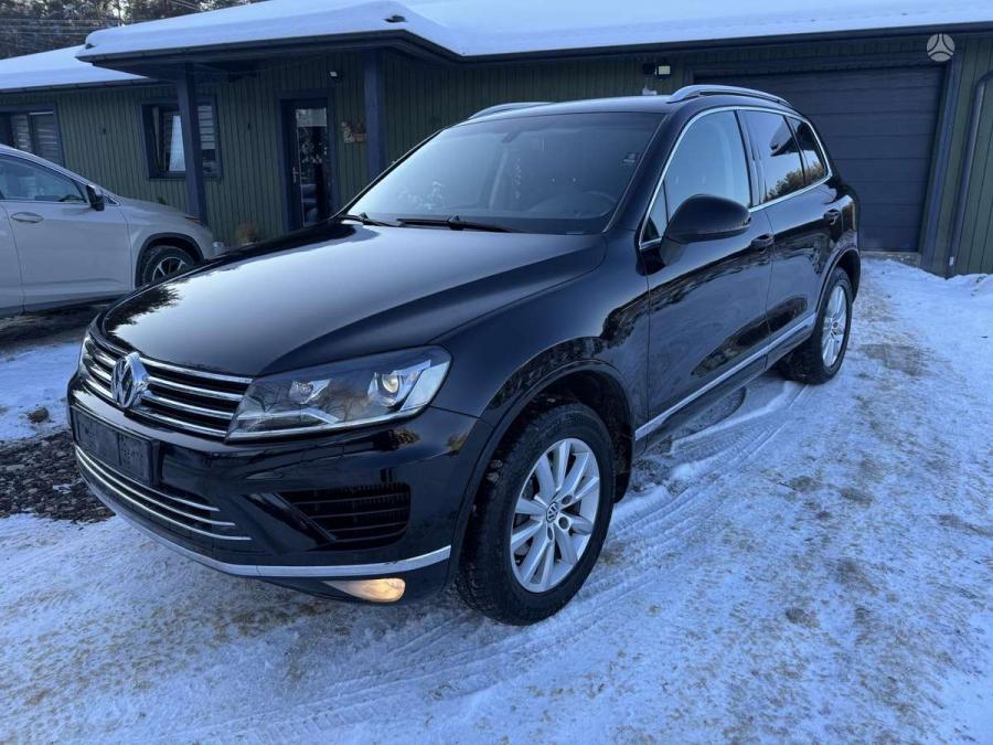 Melns Volkswagen Touareg 2015 Elektrėnai, ar dzinēja tilpumu 3.00 L un nobraukumu 255 tūkst. km par 13999 €, foto 1 vietnē AUTOMOTO.COM.LV