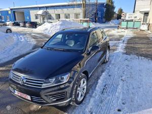 Black Volkswagen Touareg 2015 in Siauliai, with an engine capacity of 3.60 L and mileage of 225 thousand km for 13500 €, photo  on AUTOMOTO.COM.LV