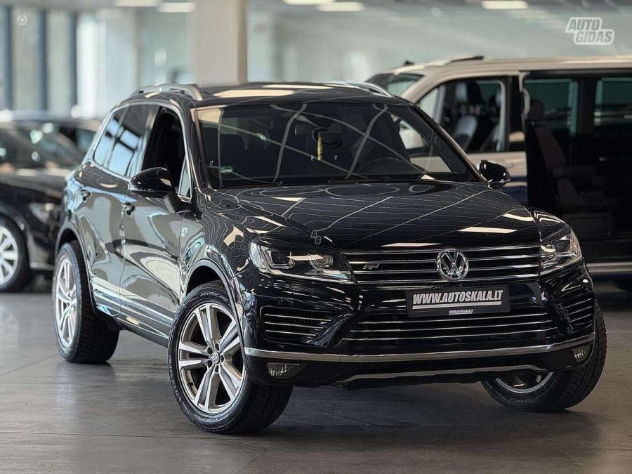 Black Volkswagen Touareg 2015 in Klaipeda, with an engine capacity of 4.10 L and mileage of 311 thousand km for 17950 €, photo 5 on AUTOMOTO.COM.LV