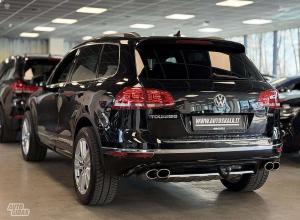 Black Volkswagen Touareg 2015 in Klaipeda, with an engine capacity of 4.10 L and mileage of 311 thousand km for 17950 €, photo 13 on AUTOMOTO.COM.LV