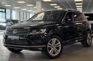 Black Volkswagen Touareg 2015 in Klaipeda, with an engine capacity of 4.10 L and mileage of 311 thousand km for 17950 €, photo 31 on AUTOMOTO.COM.LV