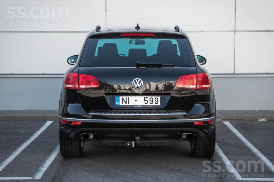 Black Volkswagen Touareg 2015 in Riga, with an engine capacity of 3.00 L and mileage of 0 thousand km for 13990 €, photo 6 on AUTOMOTO.COM.LV