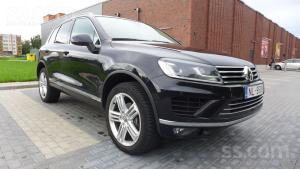 Black Volkswagen Touareg 2015 in Kuldiga, with an engine capacity of 3.00 L and mileage of 315 thousand km for 13900 €, photo 3 on AUTOMOTO.COM.LV