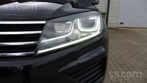 Black Volkswagen Touareg 2015 in Kuldiga, with an engine capacity of 3.00 L and mileage of 315 thousand km for 13900 €, photo 22 on AUTOMOTO.COM.LV