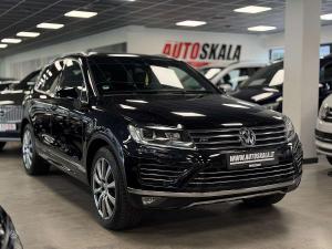 Black Volkswagen Touareg 2015 in Klaipeda, with an engine capacity of 4.13 L and mileage of 311 thousand km for 17950 €, photo 4 on AUTOMOTO.COM.LV