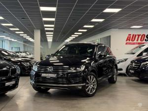 Black Volkswagen Touareg 2015 in Klaipeda, with an engine capacity of 4.13 L and mileage of 311 thousand km for 17950 €, photo 12 on AUTOMOTO.COM.LV