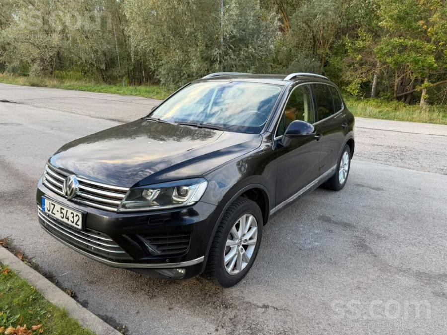 Black Volkswagen Touareg 2015 in Riga, with an engine capacity of 3.00 L and mileage of 204 thousand km for 11500 €, photo 3 on AUTOMOTO.COM.LV