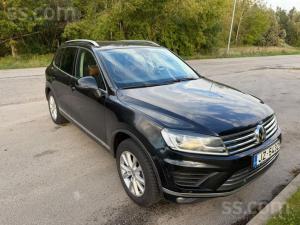 Black Volkswagen Touareg 2015 in Riga, with an engine capacity of 3.00 L and mileage of 204 thousand km for 11500 €, photo 4 on AUTOMOTO.COM.LV