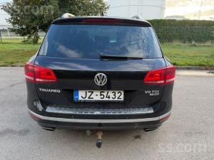 Black Volkswagen Touareg 2015 in Riga, with an engine capacity of 3.00 L and mileage of 204 thousand km for 11500 €, photo 7 on AUTOMOTO.COM.LV