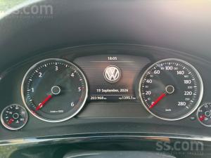 Black Volkswagen Touareg 2015 in Riga, with an engine capacity of 3.00 L and mileage of 204 thousand km for 11500 €, photo 9 on AUTOMOTO.COM.LV