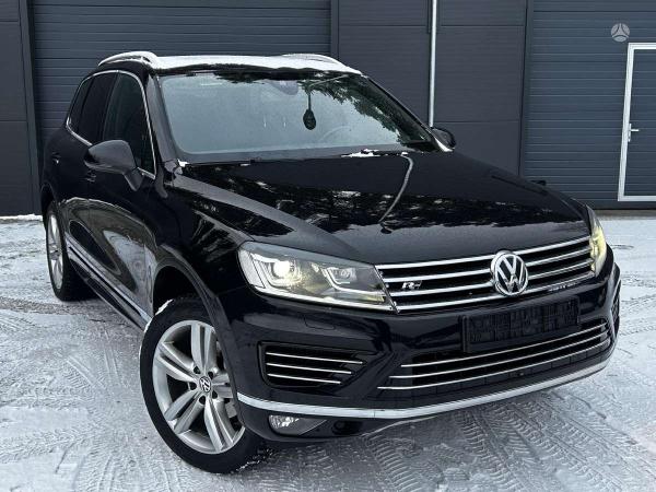 Black Volkswagen Touareg 2016 in Utena, with an engine capacity of 2.97 L and mileage of 310 thousand km for 15200 €, photo 7 on AUTOMOTO.COM.LV