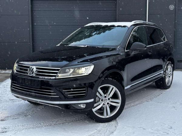 Black Volkswagen Touareg 2016 in Utena, with an engine capacity of 2.97 L and mileage of 310 thousand km for 15200 €, photo 9 on AUTOMOTO.COM.LV