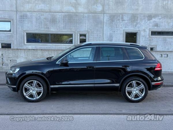 Black Volkswagen Touareg 2016 in Tallinn, with an engine capacity of 3.00 L and mileage of 204 thousand km for 16550 €, photo 3 on AUTOMOTO.COM.LV