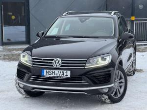Black Volkswagen Touareg 2016 in Jonava, with an engine capacity of 3.00 L and mileage of 290 thousand km for 15850 €, photo  on AUTOMOTO.COM.LV