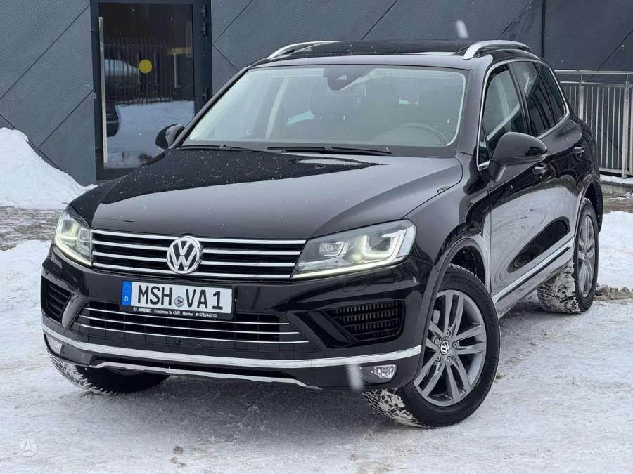 Black Volkswagen Touareg 2016 in Jonava, with an engine capacity of 3.00 L and mileage of 290 thousand km for 15850 €, photo 2 on AUTOMOTO.COM.LV