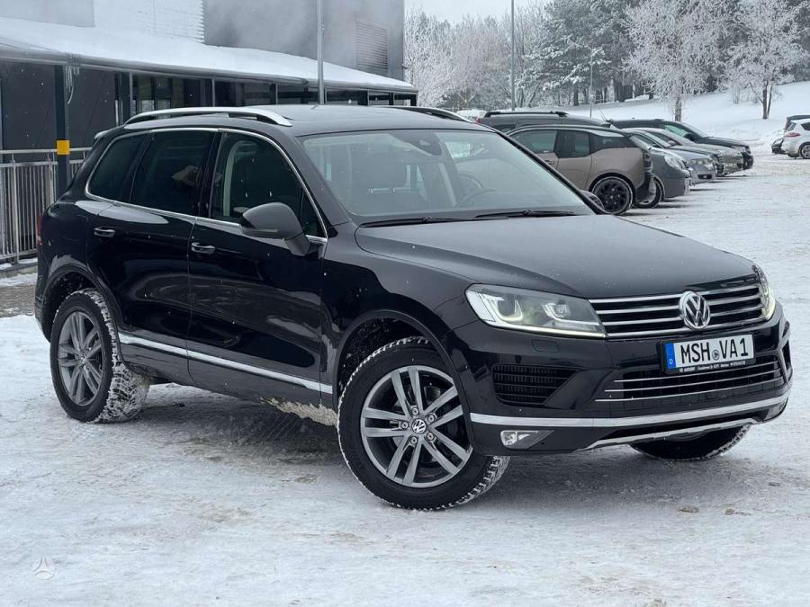 Black Volkswagen Touareg 2016 in Jonava, with an engine capacity of 3.00 L and mileage of 290 thousand km for 15850 €, photo 11 on AUTOMOTO.COM.LV