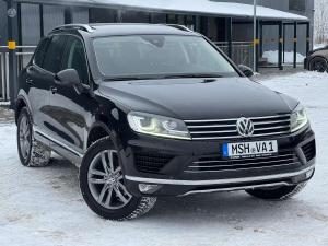 Black Volkswagen Touareg 2016 in Jonava, with an engine capacity of 3.00 L and mileage of 290 thousand km for 15850 €, photo 12 on AUTOMOTO.COM.LV