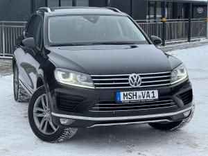Black Volkswagen Touareg 2016 in Jonava, with an engine capacity of 3.00 L and mileage of 290 thousand km for 15850 €, photo 13 on AUTOMOTO.COM.LV