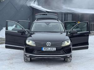 Black Volkswagen Touareg 2016 in Jonava, with an engine capacity of 3.00 L and mileage of 290 thousand km for 15850 €, photo 15 on AUTOMOTO.COM.LV