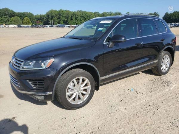 Black Volkswagen Touareg 2016 in Siauliai, with an engine capacity of 3.00 L and mileage of 150 thousand km for 6900 €, photo 1 on AUTOMOTO.COM.LV