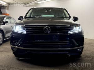 Black Volkswagen Touareg 2016 in Riga, with an engine capacity of 3.00 L and mileage of 299 thousand km for 13700 €, photo  on AUTOMOTO.COM.LV