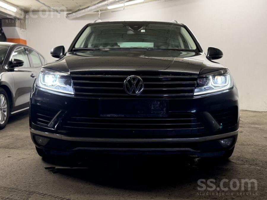 Melns Volkswagen Touareg 2016 Rīga, ar dzinēja tilpumu 3.00 L un nobraukumu 299 tūkst. km par 13700 €, foto 1 vietnē AUTOMOTO.COM.LV