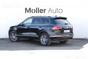 Black Volkswagen Touareg 2016 in Riga, with an engine capacity of 3.00 L and mileage of 188 thousand km for 17500 €, photo 3 on AUTOMOTO.COM.LV