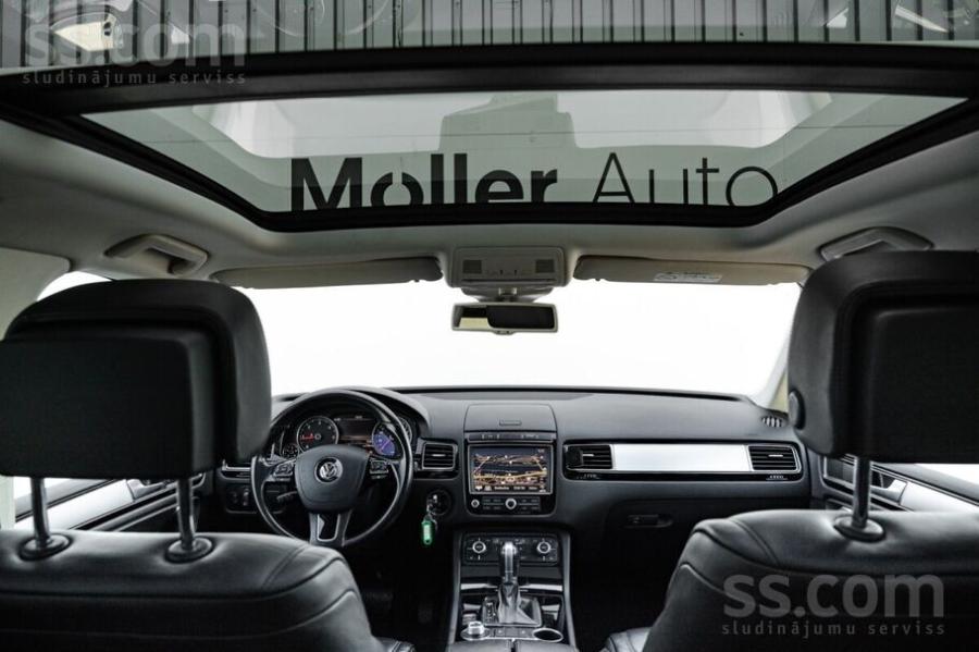 Black Volkswagen Touareg 2016 in Riga, with an engine capacity of 3.00 L and mileage of 188 thousand km for 17500 €, photo 6 on AUTOMOTO.COM.LV
