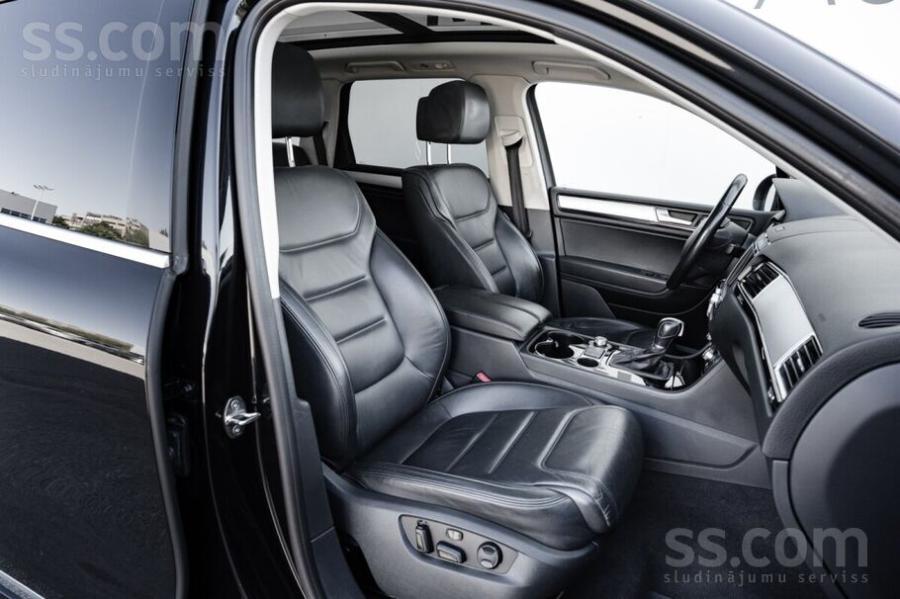 Black Volkswagen Touareg 2016 in Riga, with an engine capacity of 3.00 L and mileage of 188 thousand km for 17500 €, photo 7 on AUTOMOTO.COM.LV