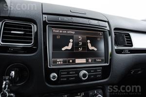 Black Volkswagen Touareg 2016 in Riga, with an engine capacity of 3.00 L and mileage of 188 thousand km for 17500 €, photo 22 on AUTOMOTO.COM.LV