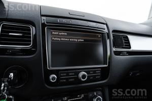 Black Volkswagen Touareg 2016 in Riga, with an engine capacity of 3.00 L and mileage of 188 thousand km for 17500 €, photo 23 on AUTOMOTO.COM.LV